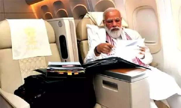 Picture of PM Modi reading documents in the plane went viral on social ...